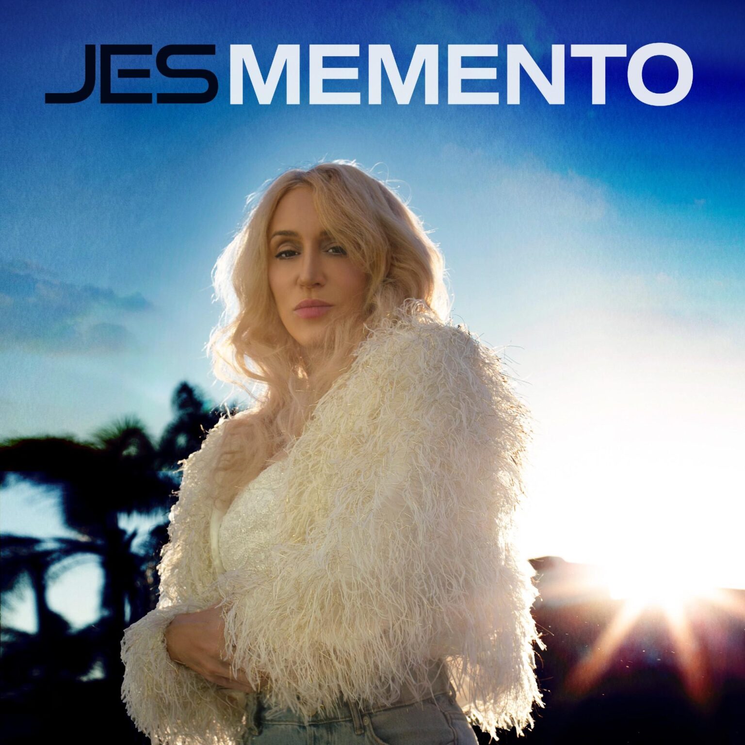 JES releases her first artist album in 10 years, 'MEMENTO'